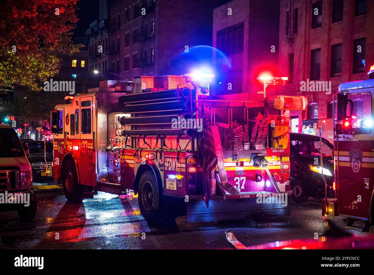 Firefighter pumper truck responding to a emergency call Stock Photo - Alamy