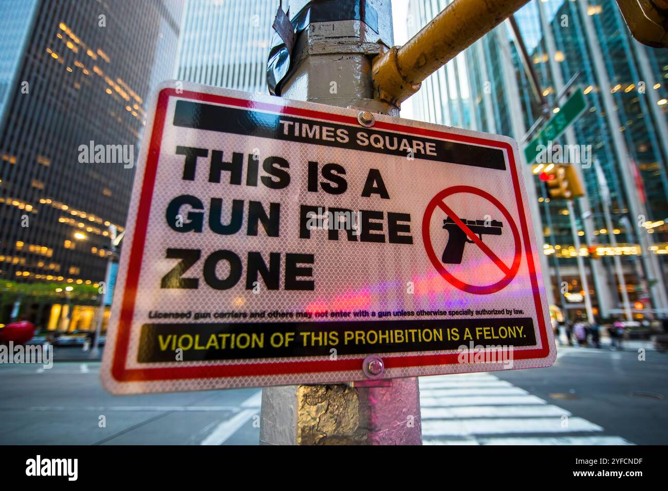 Gun Free Zone signs sprout in Times Square in New York Stock Photo - Alamy