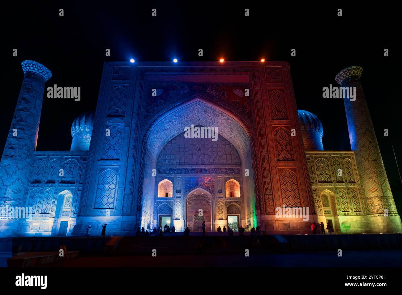 Night view of the Sher-Dor Madrasah located by Registan square. It is ...