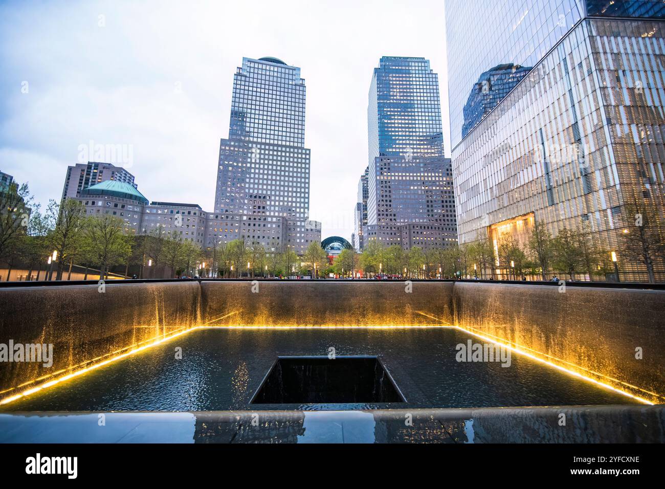 This image depicts the 911 Memorial in New York City, featuring the ...