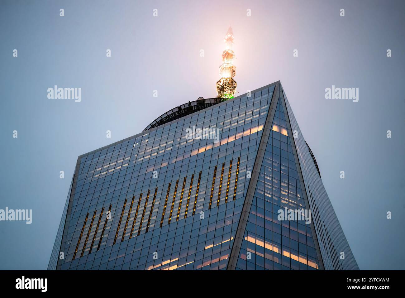 A dramatic low-angle view of One World Trade Center in New York City ...