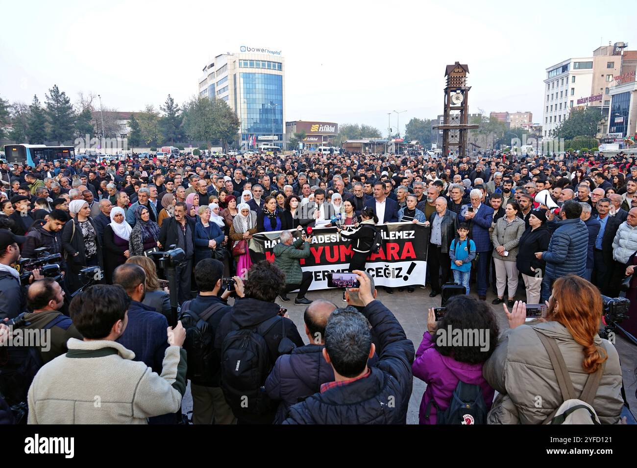 Diyarbakir, Turkey. 04th Nov, 2024. A large crowd of protesters is seen ...