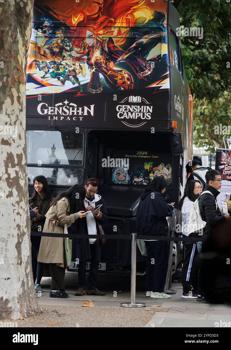 The Genshin Campus bus on tour at the south bank of the river Thames ...