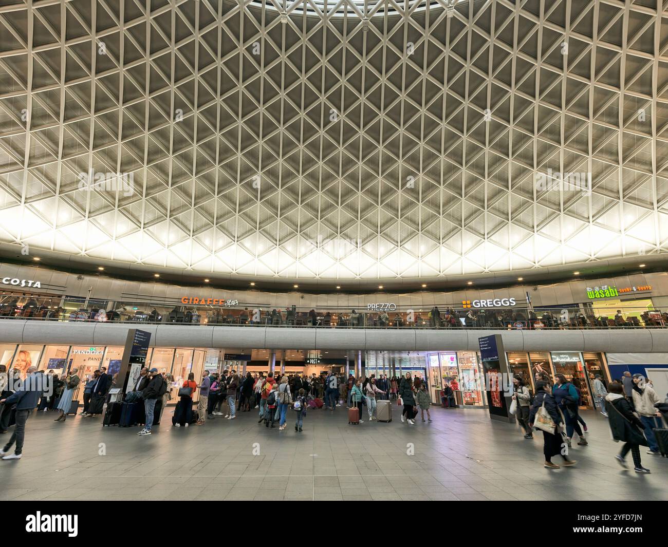 Passengers concourse King's Cross rail station London England Stock ...