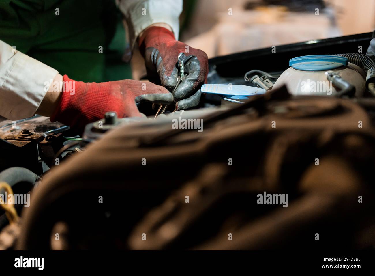 Hands Working on Car Engine with Tools and Mechanical Components Stock ...