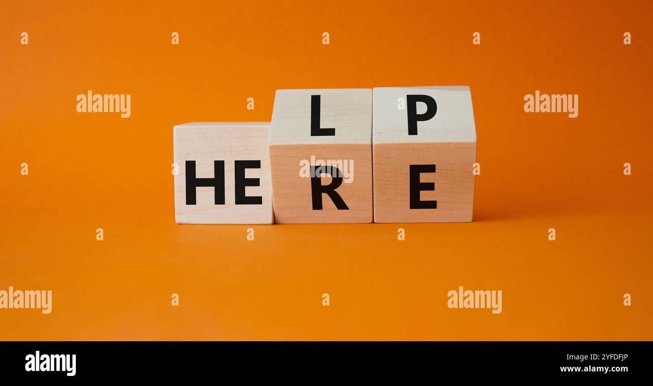 Help is here symbol. Turned wooden cubes with words Here to Help ...