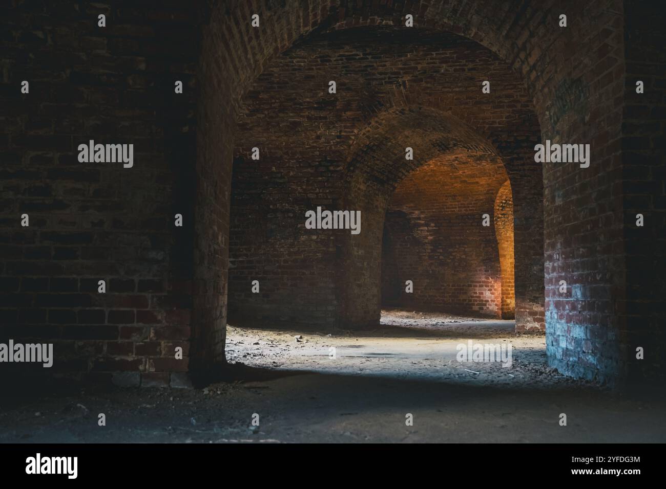 Brick walls and arches in the Bobruisk fortress. Sunlight inside the ...