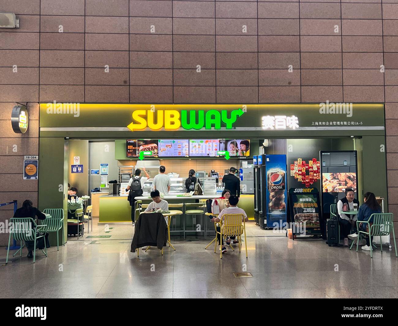 Shanghai, China. 16th Oct, 2024. Customers line up at a Subway sandwich ...