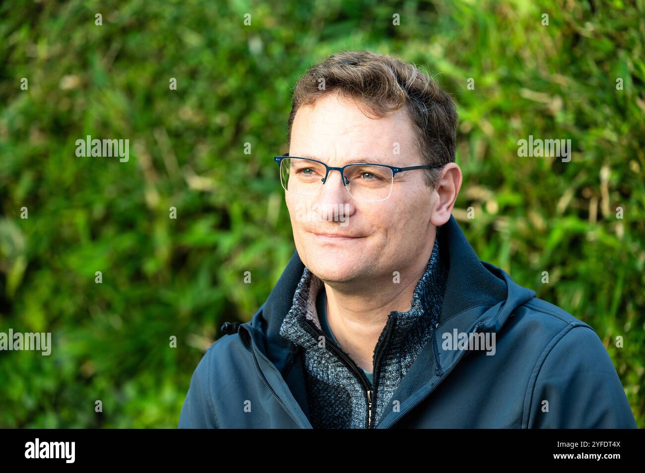 Portrait of a 45 yo white man outdoors in Koekelberg, Brussels, Belgium ...