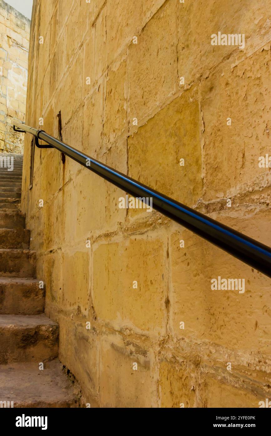 Explore the rustic charm of a historic stone staircase in a narrow ...