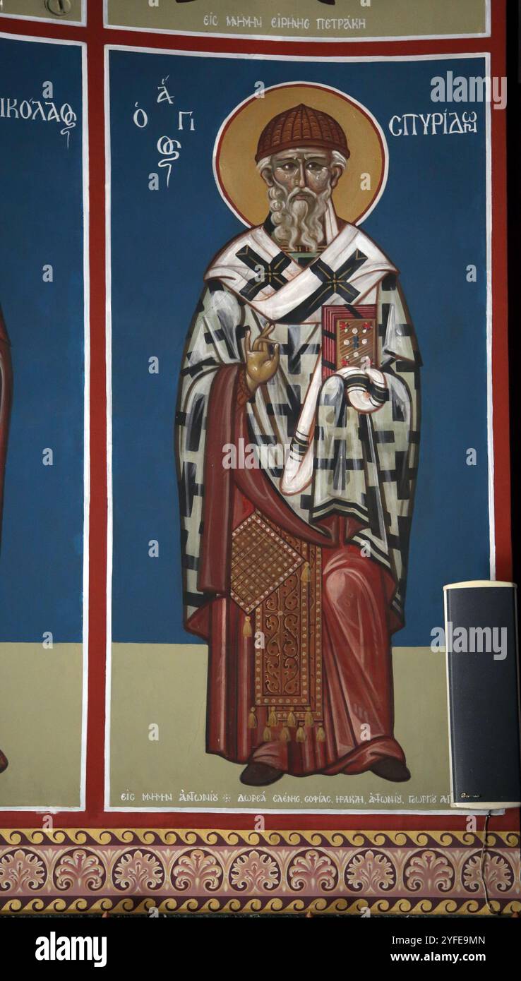 Icon of Saint Spyridon wearing a Shepherds hat and holding Book of ...