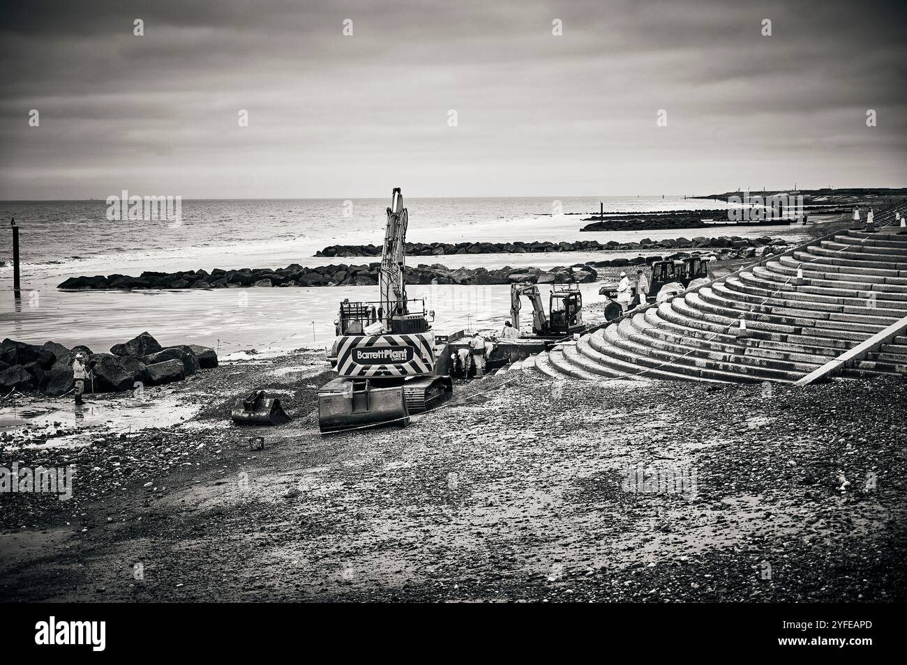 Building stone groynes on the beach at Cleveleys,UK Stock Photo - Alamy