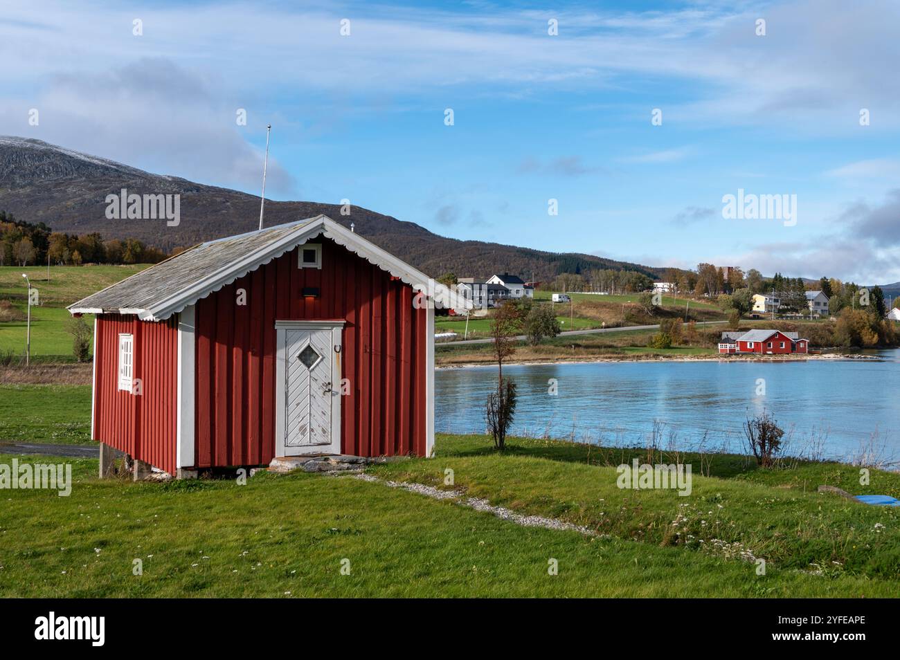 A Norwegian building painted in the traditional colours of red and ...