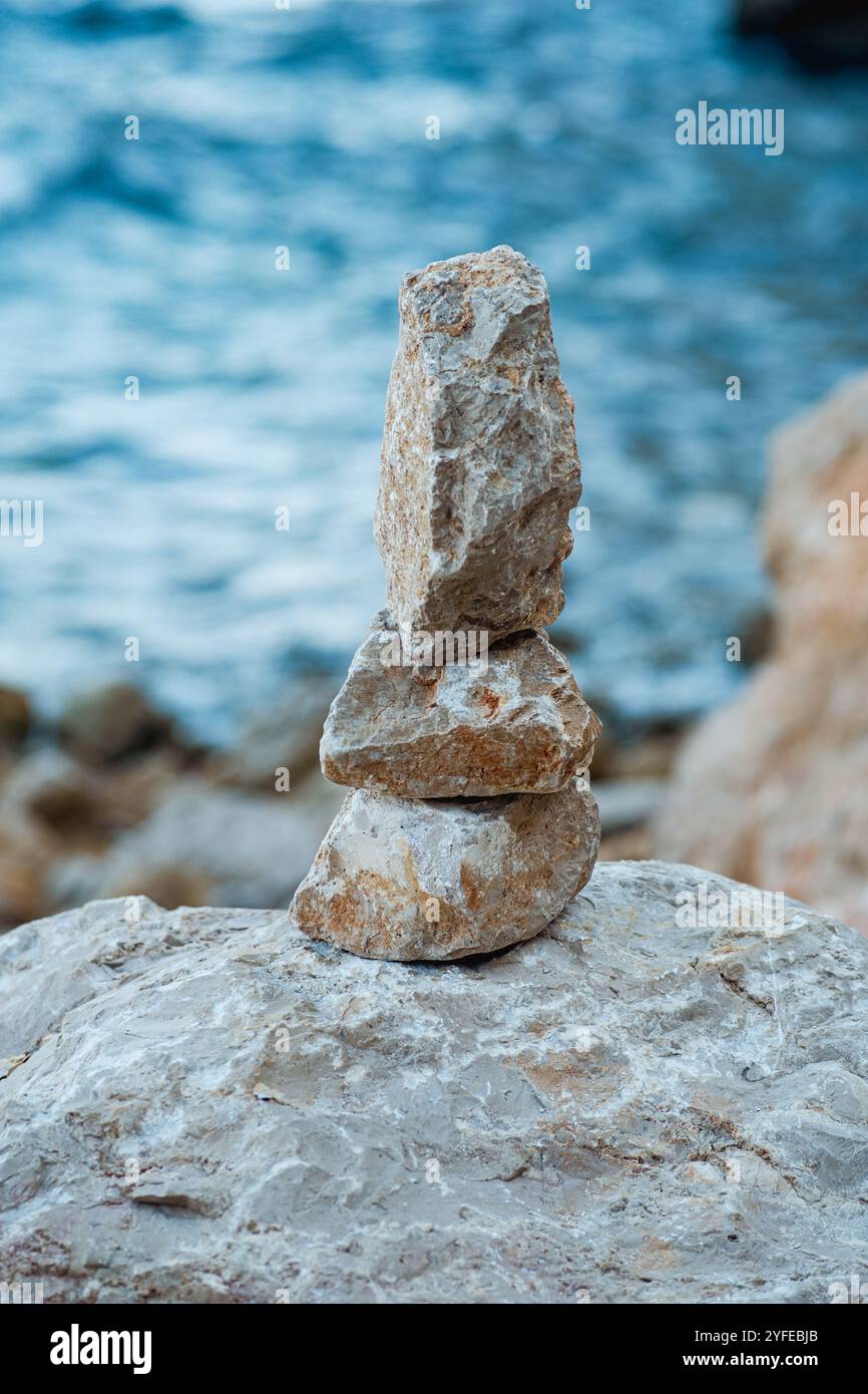 Stone pyramids on the beach Stock Photo - Alamy