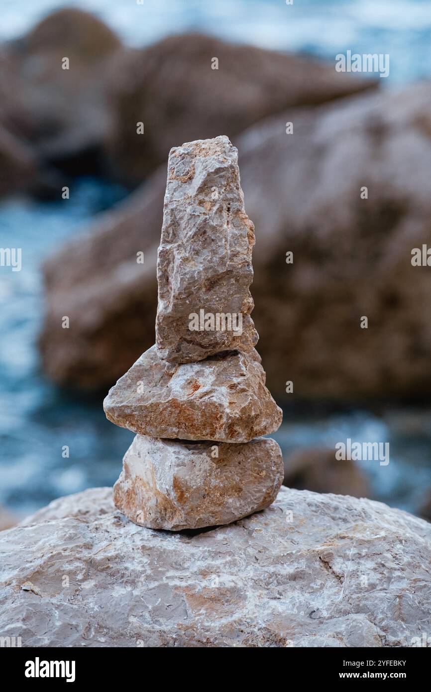 Stone pyramids on the beach Stock Photo - Alamy