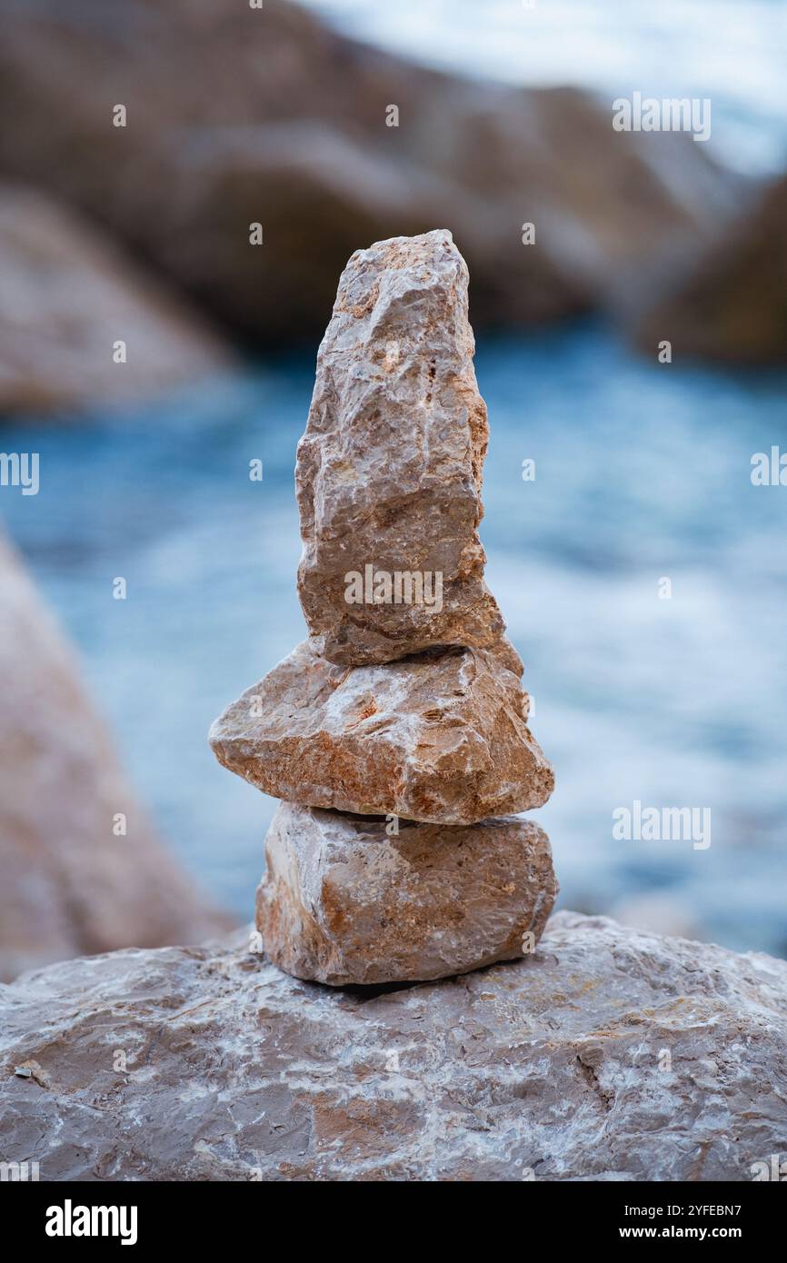 Stone pyramids on the beach Stock Photo - Alamy