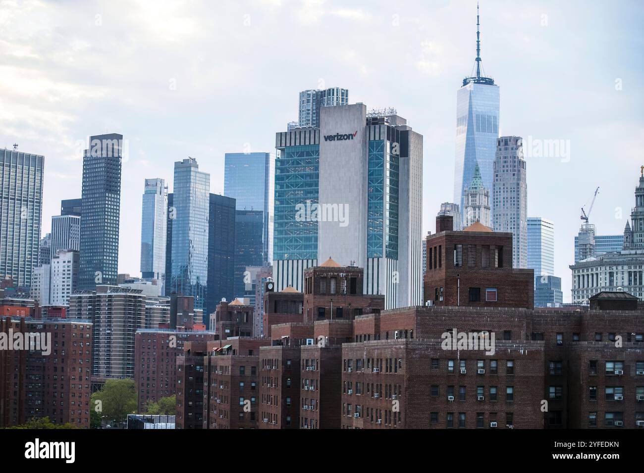 A cityscape of Lower Manhattan, New York City, featuring the Verizon ...