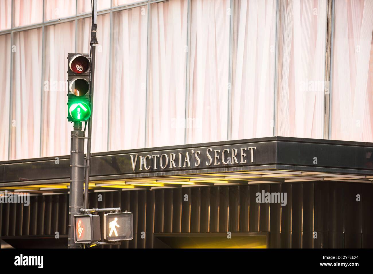 A Victoria's Secret storefront in New York City with a green traffic ...