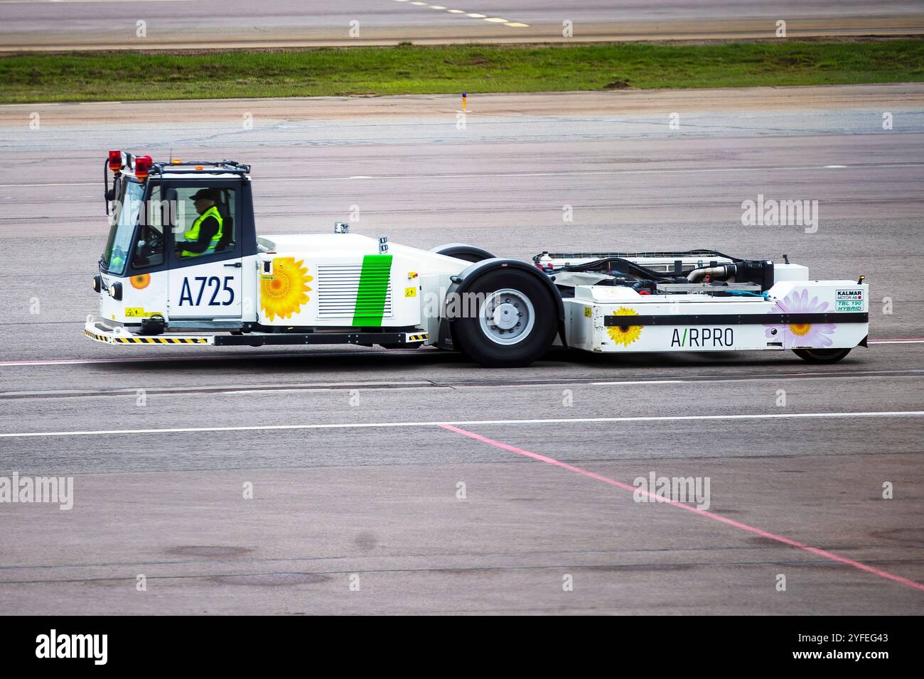 Airport tug vehicle A725 on the tarmac, used for aircraft towing Stock ...