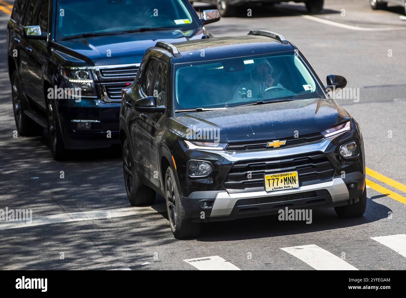 Black suv driving on city hi-res stock photography and images - Alamy