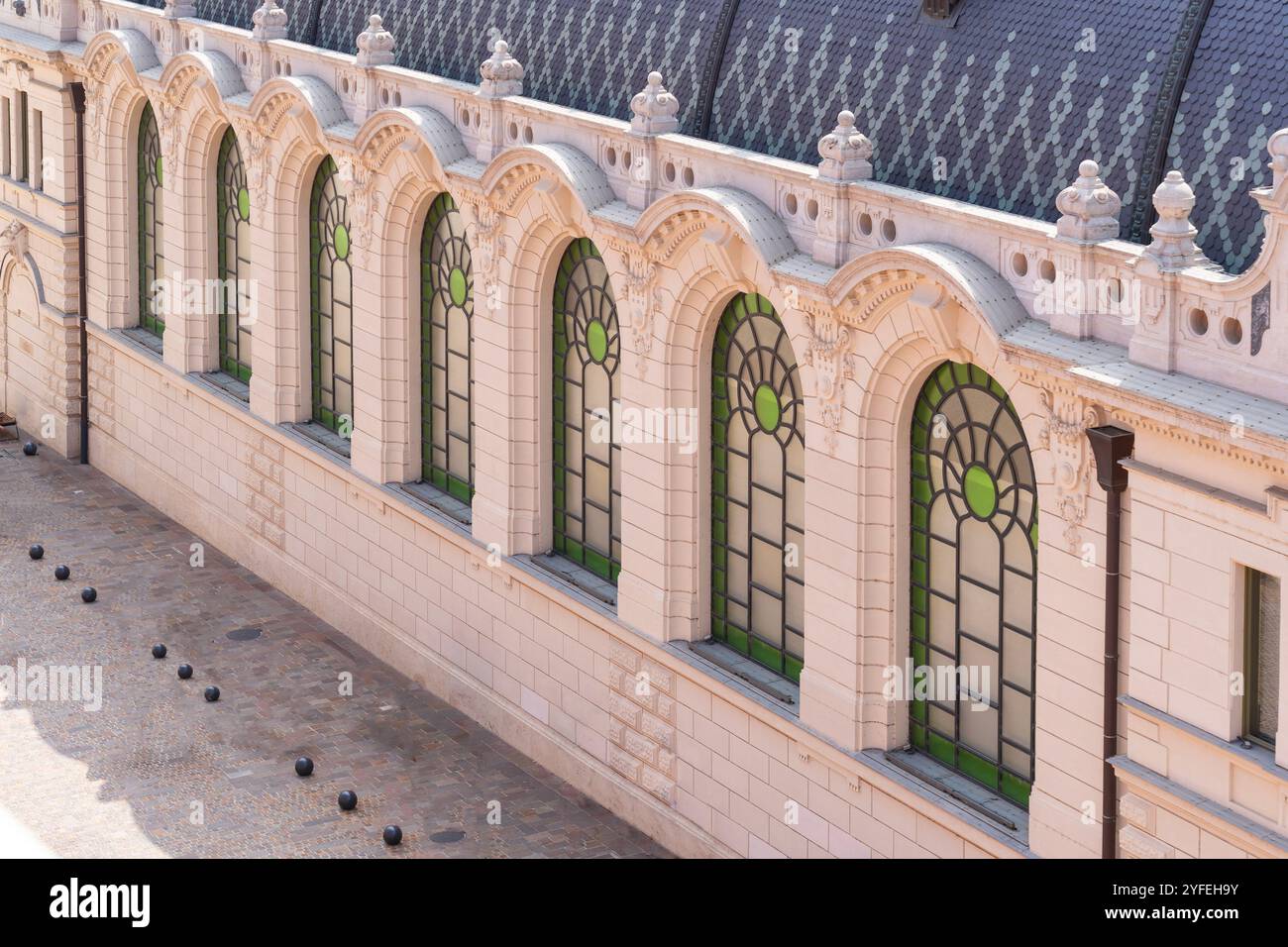 The arched stained glass windows of the Royal Riding School building in ...