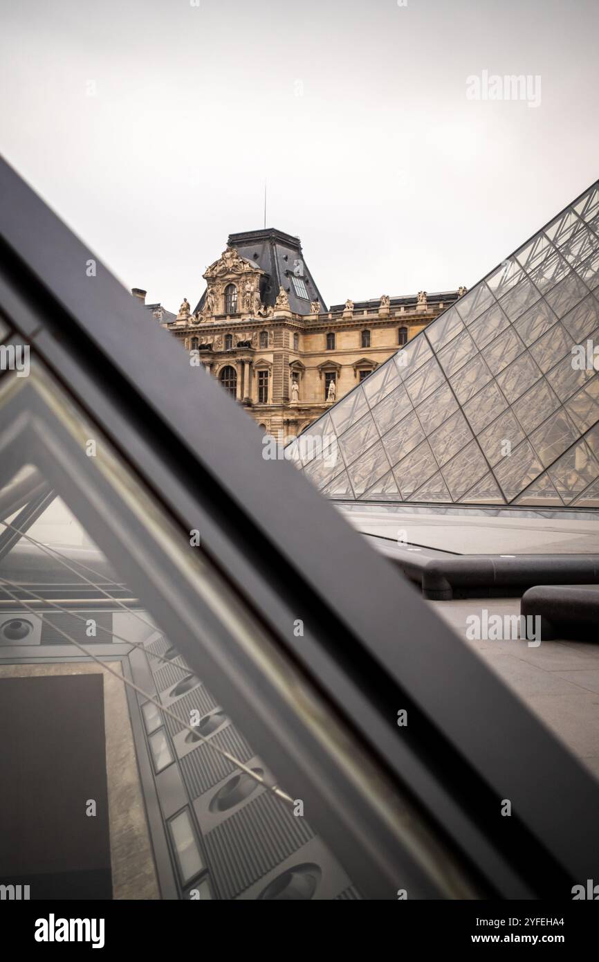 Interlocking pyramids in the courtyard of the Louvre Museum in Paris ...