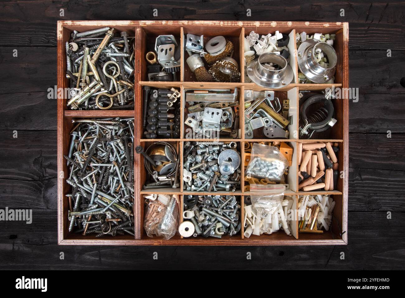 Organized Wooden Compartment Box Filled with Various Hardware Items ...