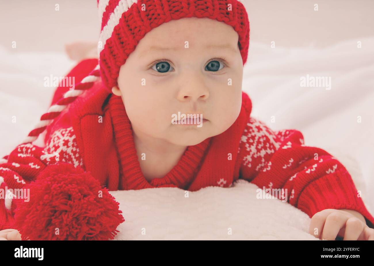 Baby dressed as Santa Claus Stock Photo - Alamy