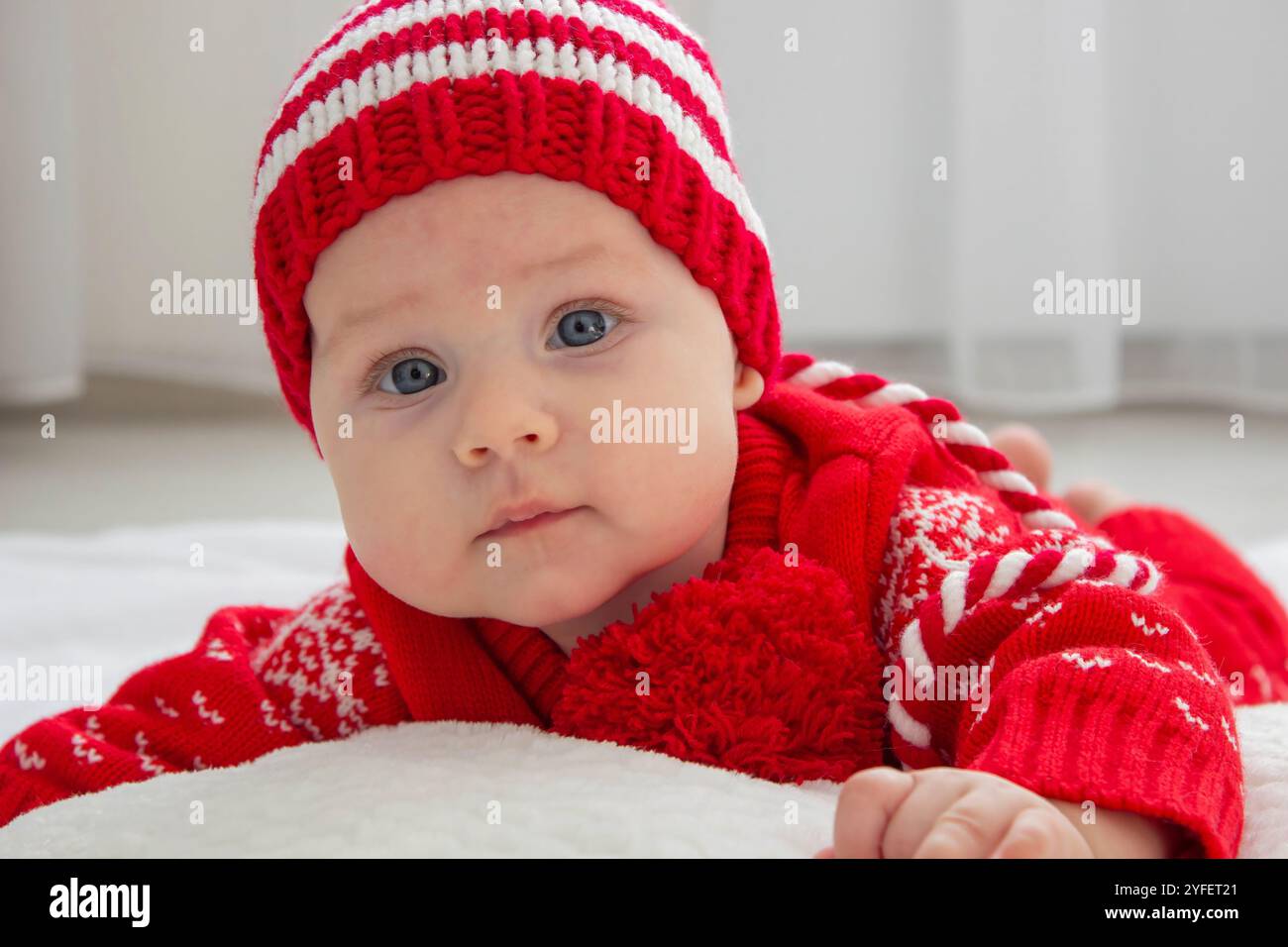 Baby dressed as Santa Claus Stock Photo - Alamy