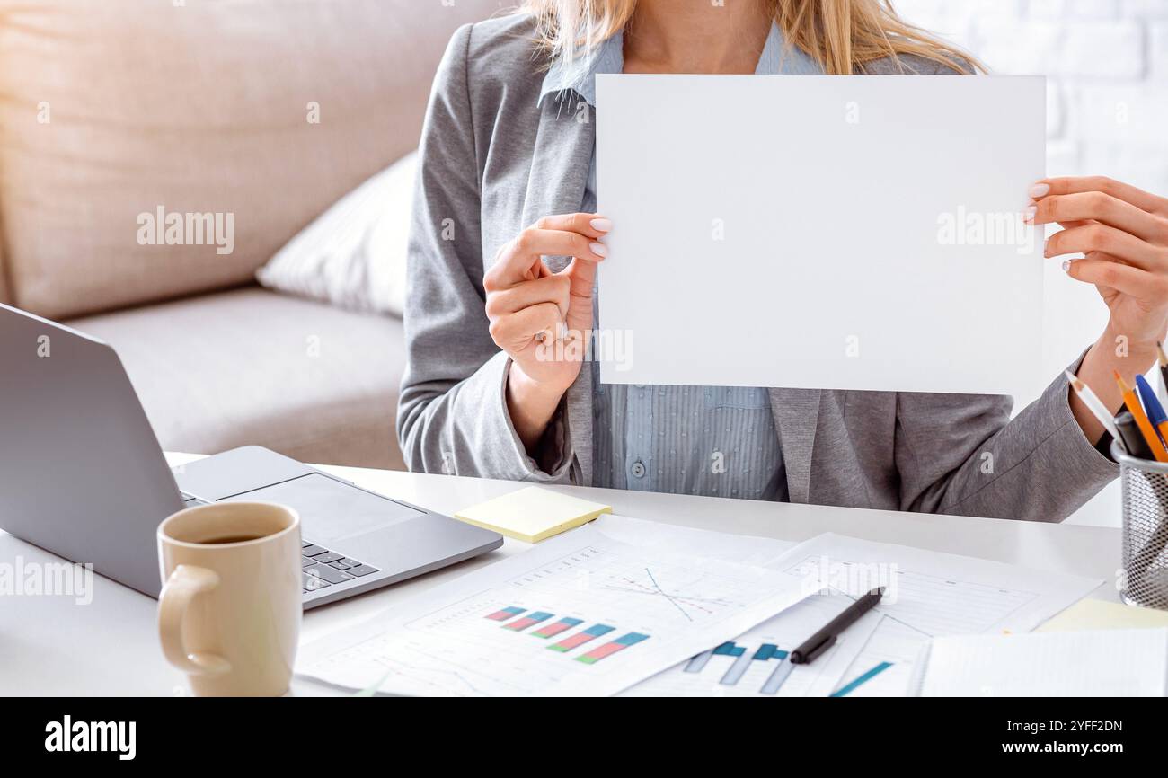 Work from home. Woman with inscription on remote workplace Stock Photo ...