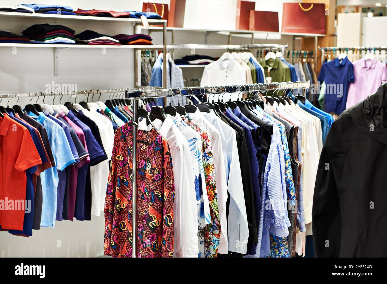 Men's shirts with short sleeves in the clothing store Stock Photo - Alamy