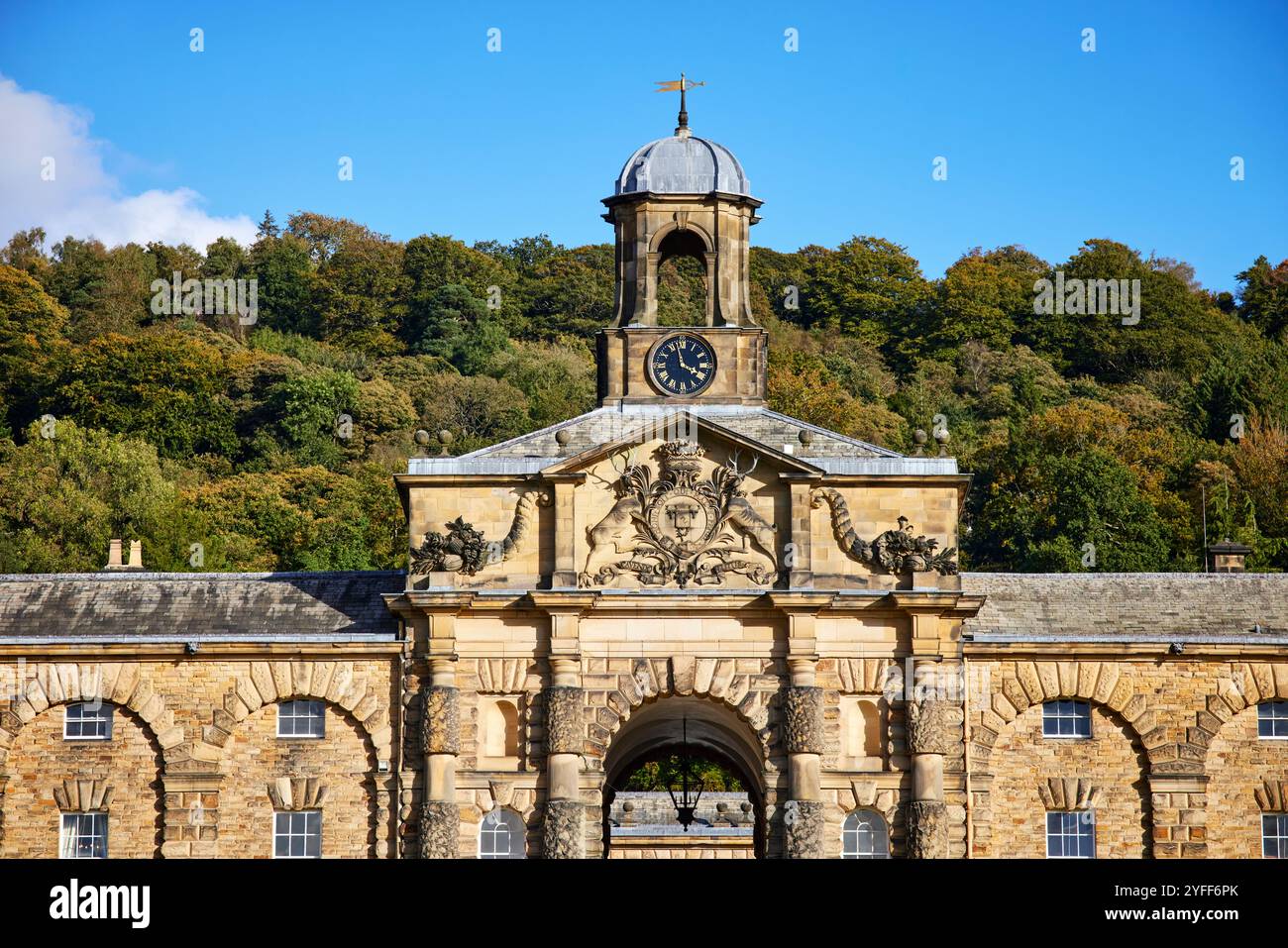 Close up detail of a coat of arms on stable block, Chatsworth House is ...
