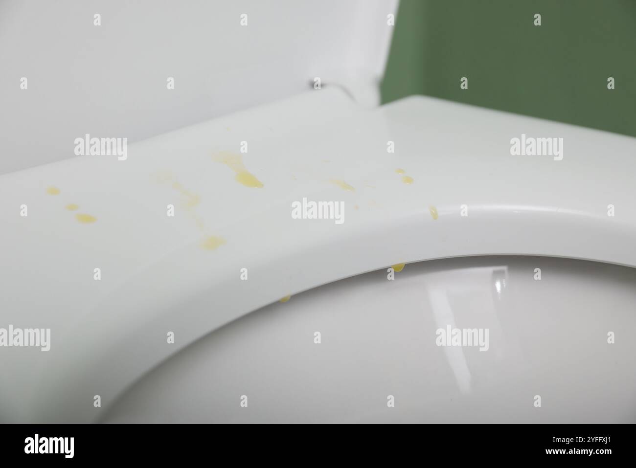 Urine drops on toilet seat in restroom, closeup Stock Photo - Alamy