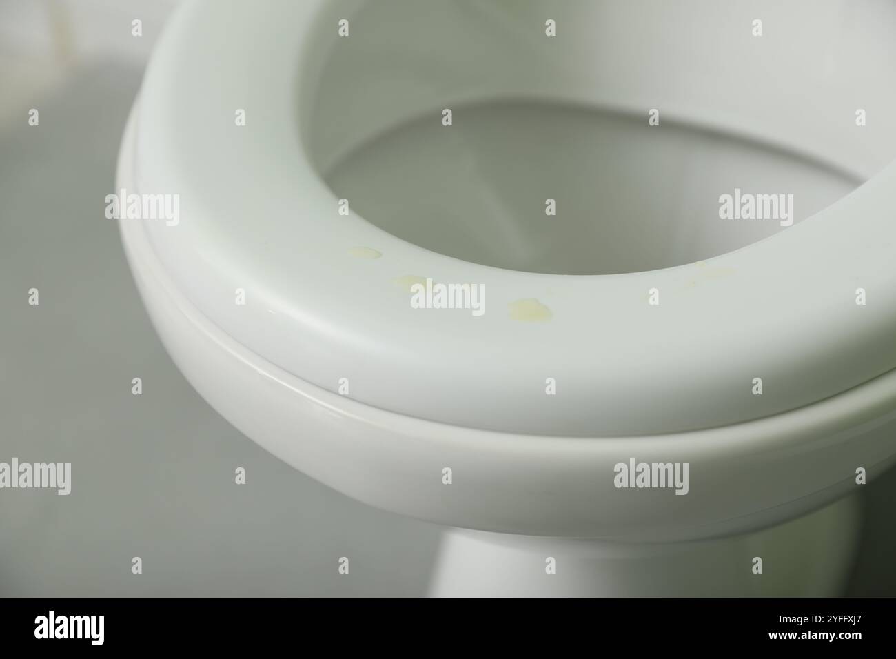 Urine drops on toilet seat in restroom, closeup Stock Photo - Alamy