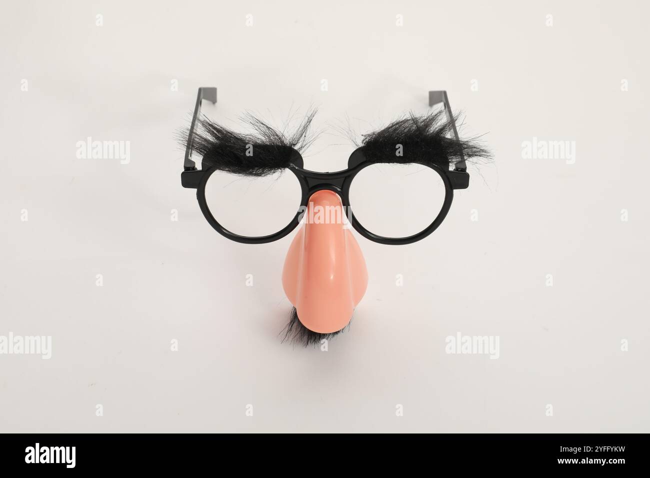 Funny mask with glasses, fake mustache and nose on white background ...