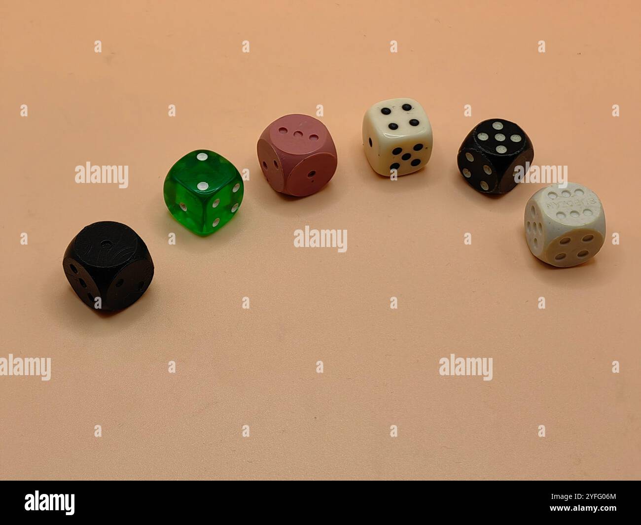 Colorful Dice Cubes on Brown Paper Surface – Numbers 1 to 6 Displayed ...