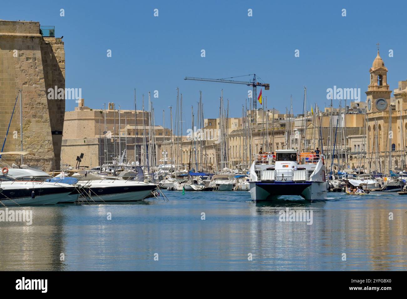 Valletta, Malta - 6 August 2023: Passenger ferry service operated by ...