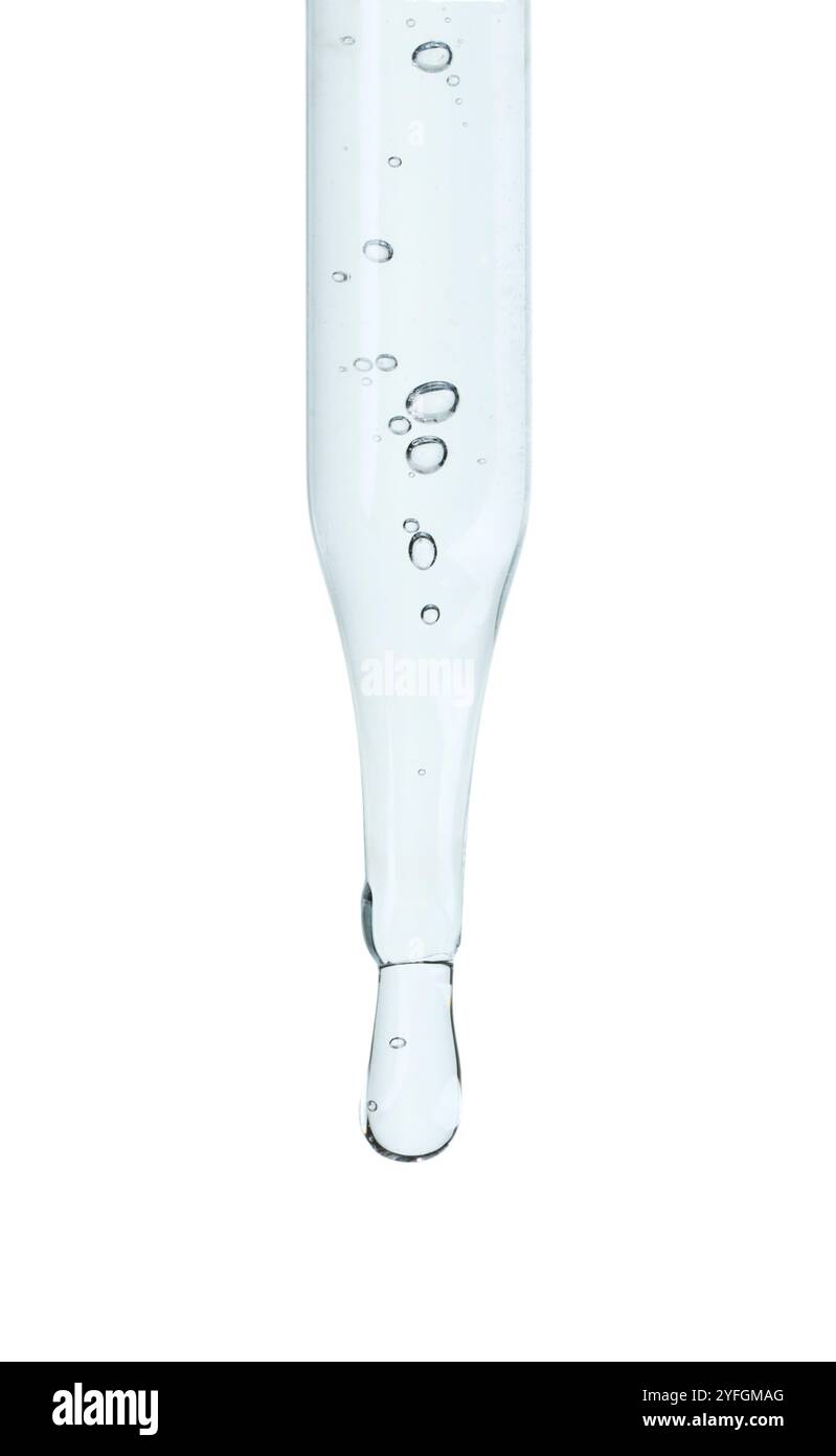 Dripping cosmetic serum from pipette on white background Stock Photo ...