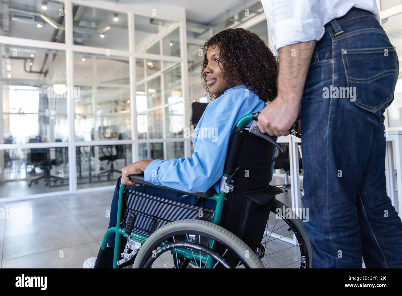 Female professional with disability working indoors from office Stock ...