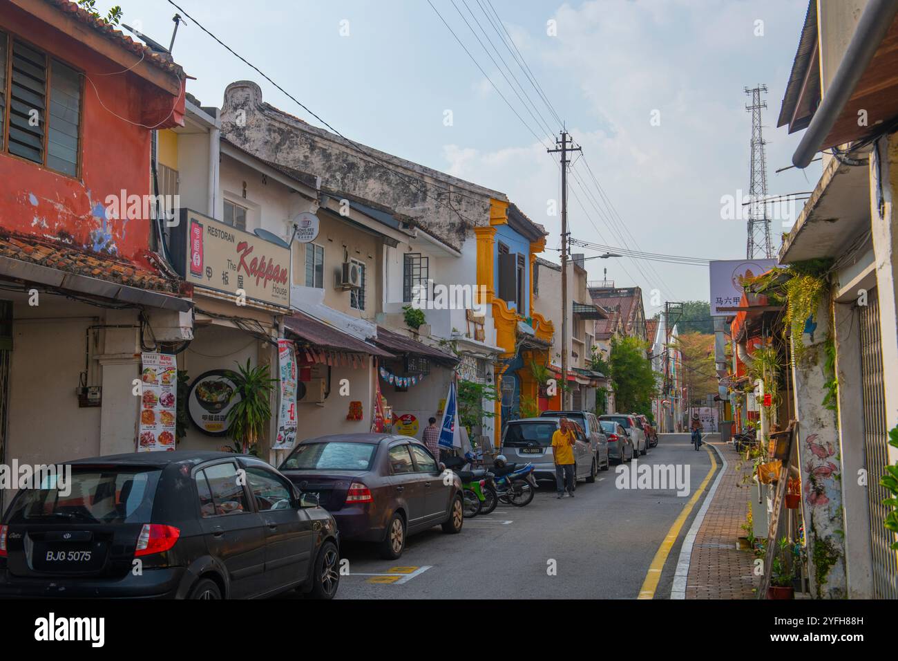 Historic buildings on Jalan Tukang Besi Street in historic city center ...