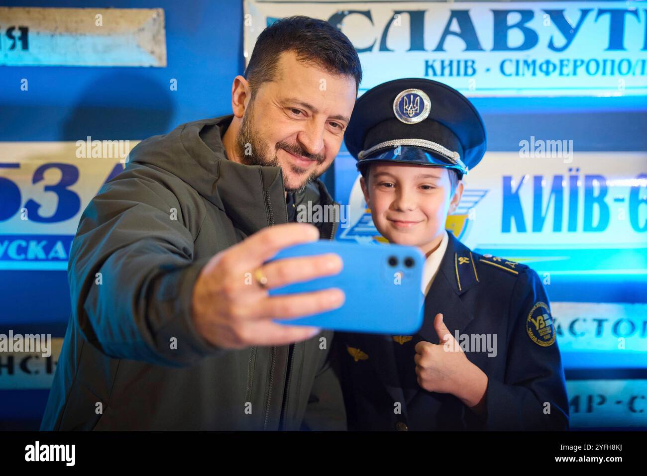 Kiev, Ukraine. 04th Nov, 2024. Ukrainian President Volodymyr Zelenskyy, takes a selfie with ...