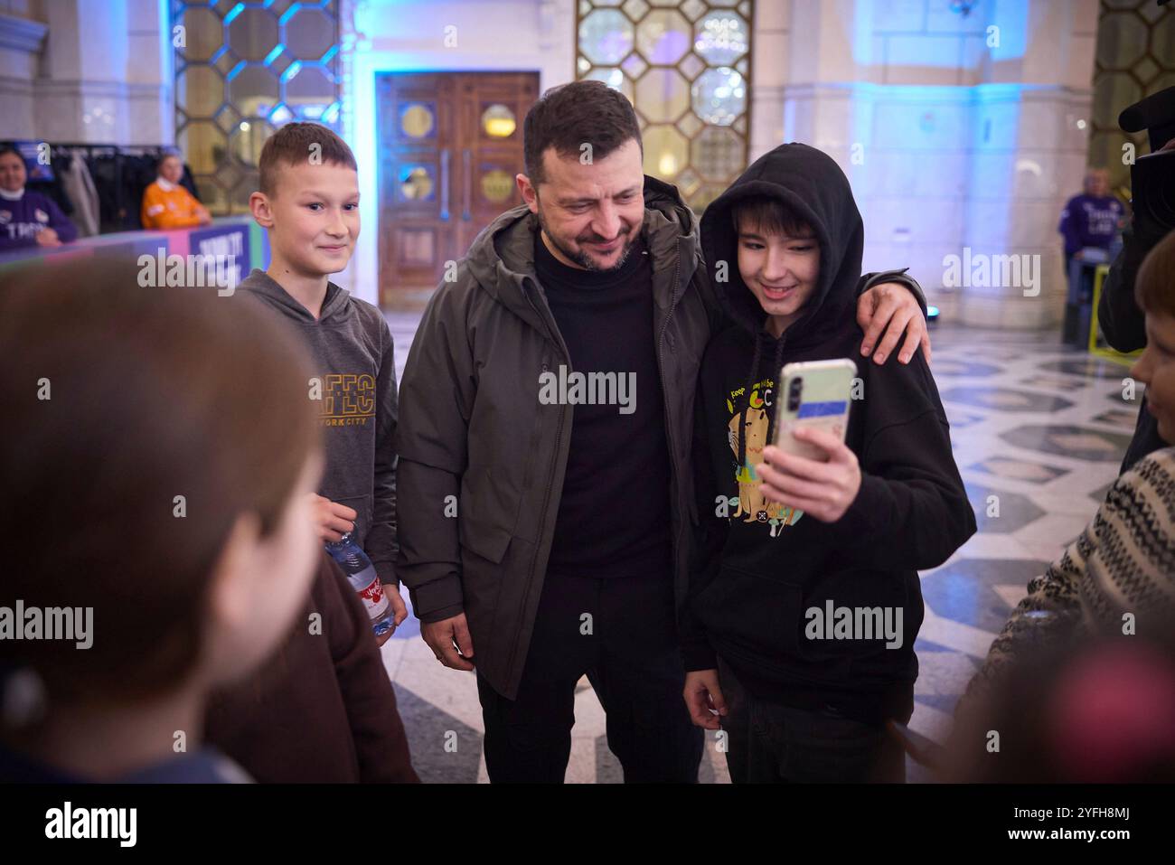 Kiev, Ukraine. 04th Nov, 2024. Ukrainian President Volodymyr Zelenskyy, takes a selfie with ...