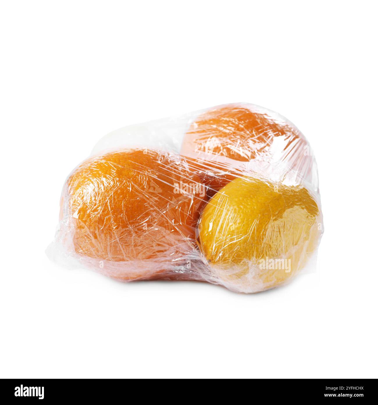 Fresh fruits with plastic food wrap isolated on white Stock Photo - Alamy