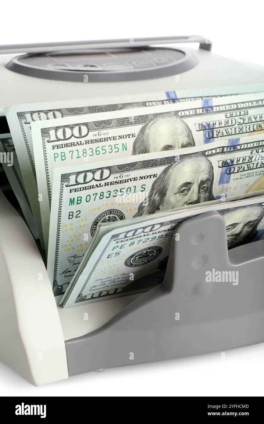 Money counter machine with dollar banknotes isolated on white Stock ...