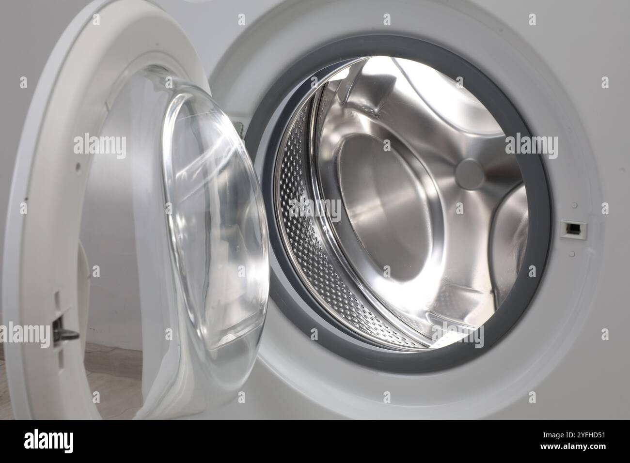 Washing machine with empty drum as background, closeup Stock Photo - Alamy