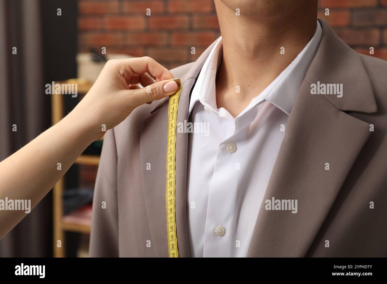 Professional male tailor taking hi-res stock photography and images - Alamy