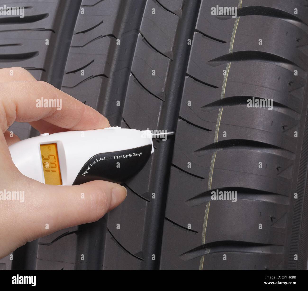 detail of depth measurement in a car tire Stock Photo - Alamy