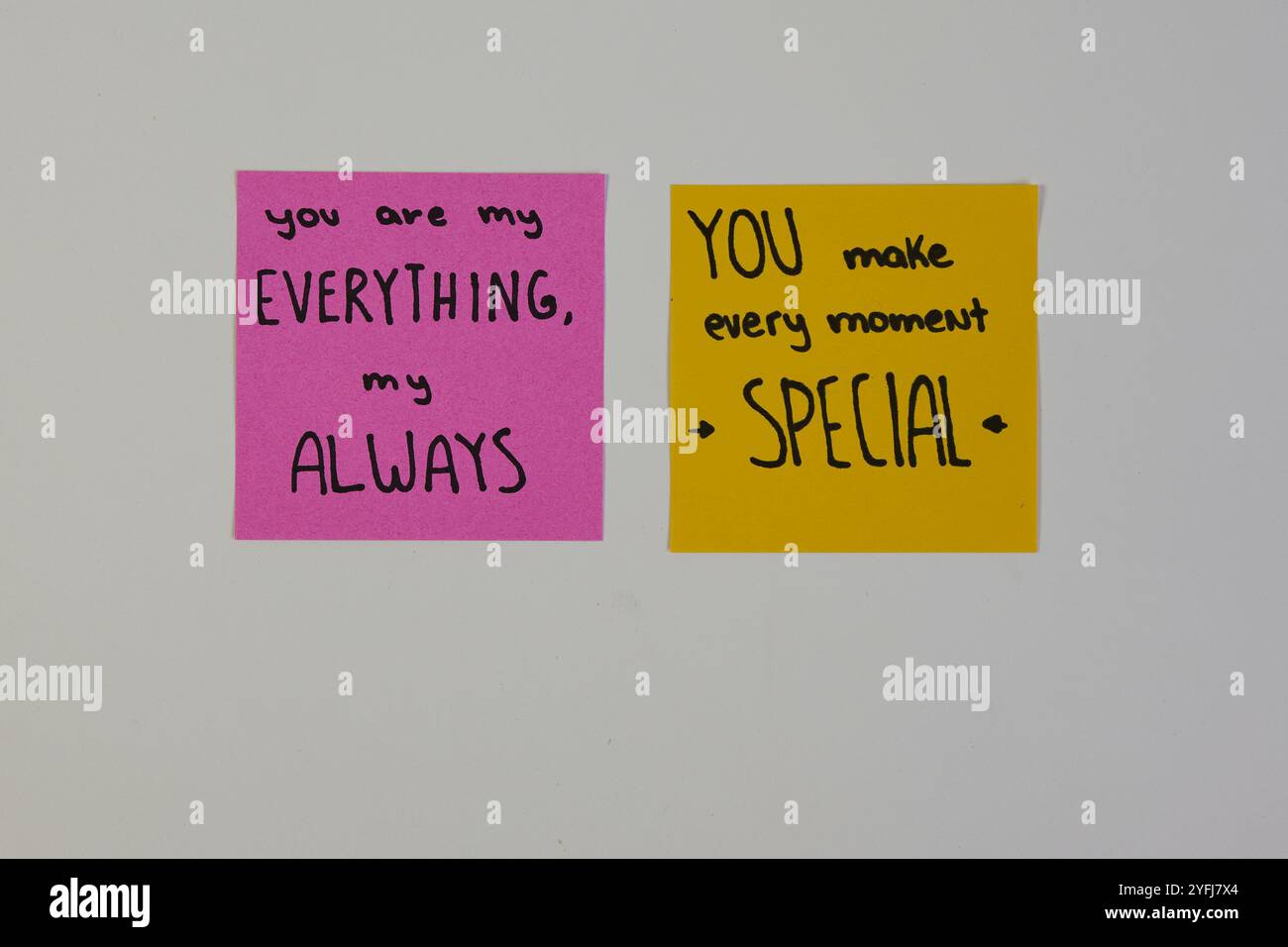 Notes with texts of Love and affection handwritten in colored post-it ...