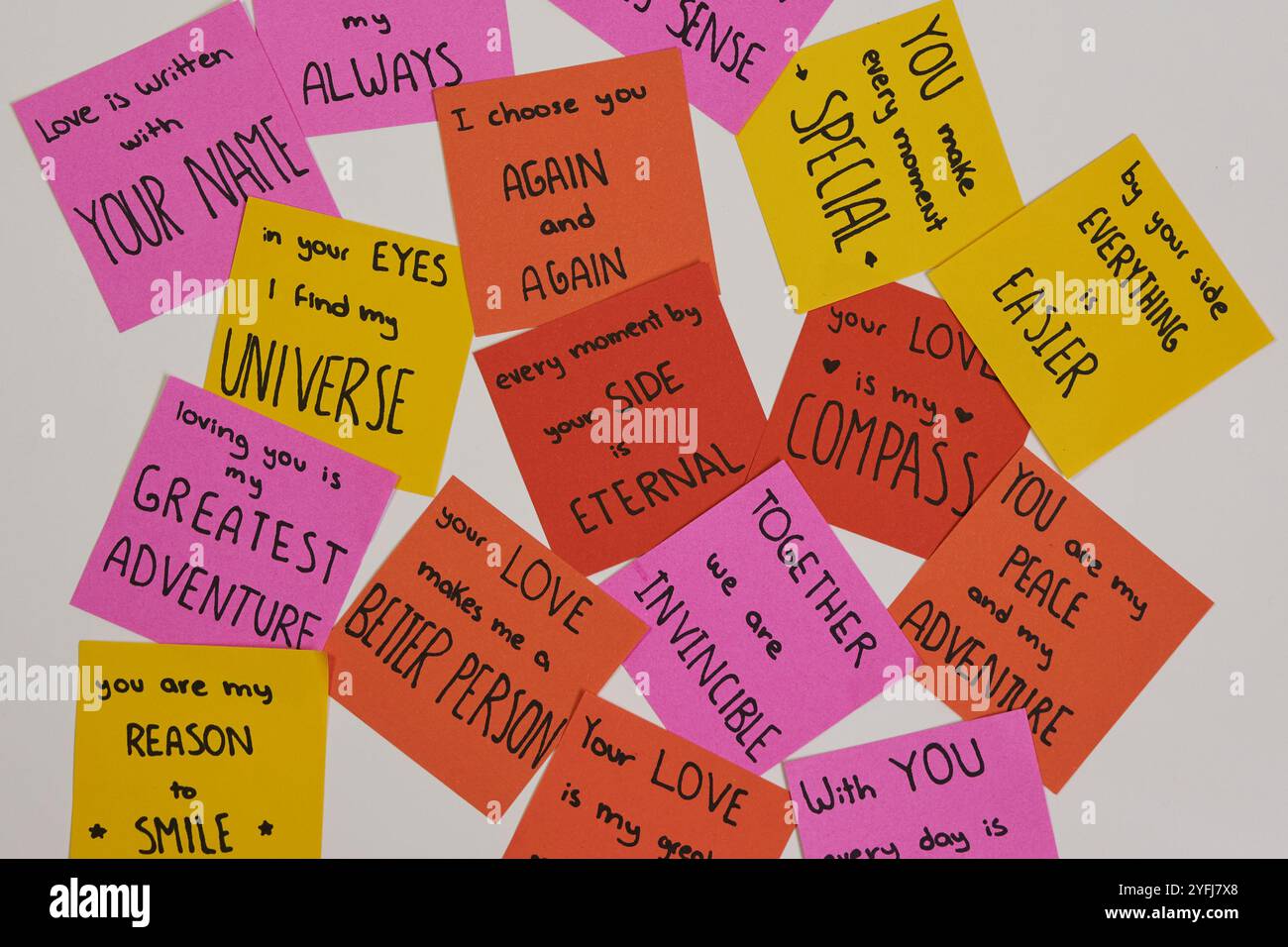 Notes with texts of Love and affection handwritten in colored post-it ...