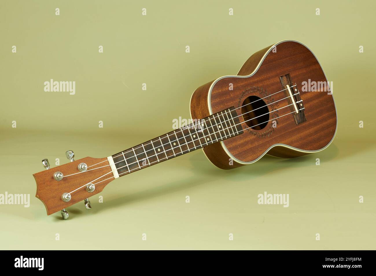 Ukulele. Hawaiian instrument that resembles a guitar but smaller in ...